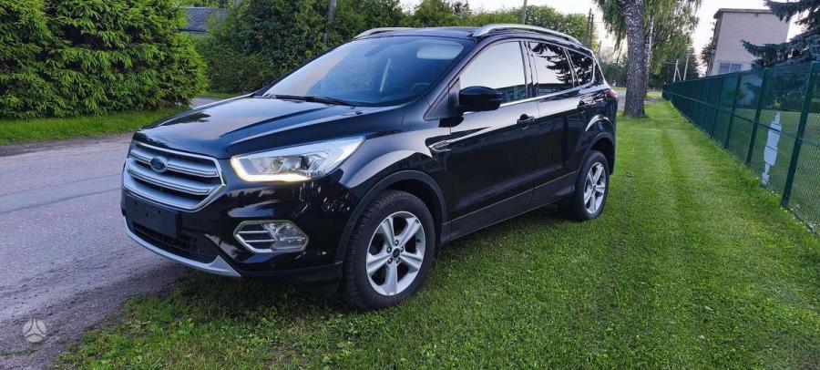 Black Ford Kuga 2019 in Marijampole, with an engine capacity of 2.00 L and mileage of 250 thousand km for 9700 €, photo 1 on AUTOMOTO.COM.LV