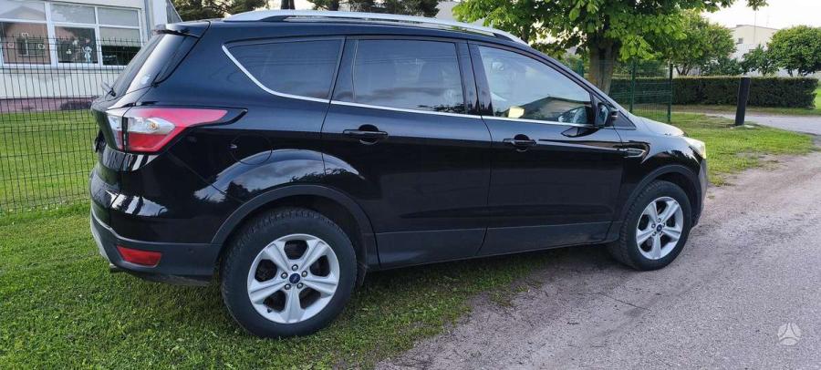 Black Ford Kuga 2019 in Marijampole, with an engine capacity of 2.00 L and mileage of 250 thousand km for 9700 €, photo 5 on AUTOMOTO.COM.LV