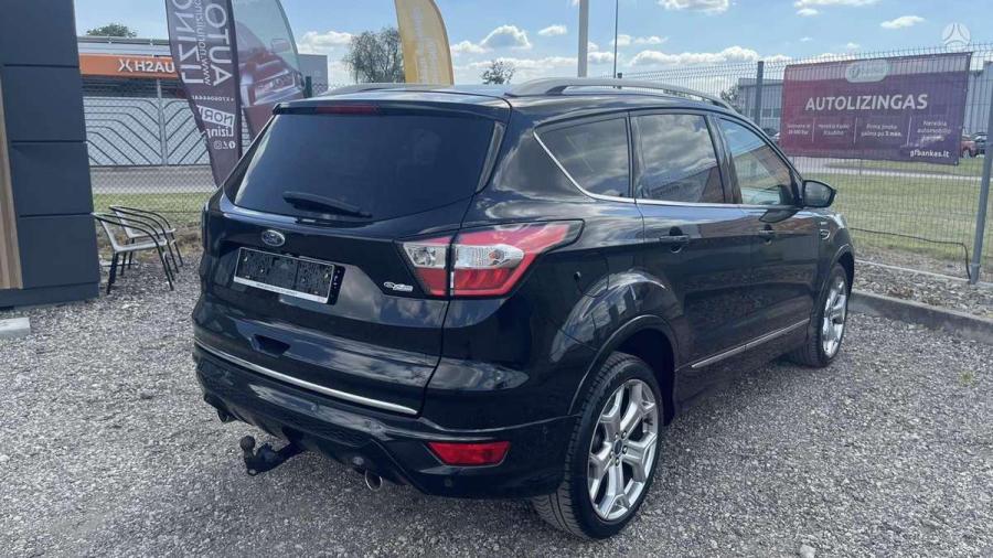 Black Ford Kuga 2019 in Marijampole, with an engine capacity of 2.00 L and mileage of 221 thousand km for 13900 €, photo 8 on AUTOMOTO.COM.LV