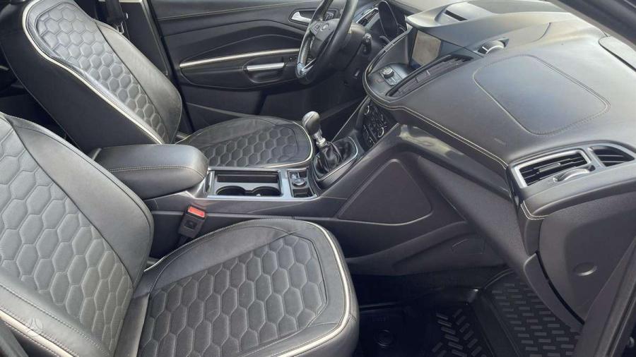 Black Ford Kuga 2019 in Marijampole, with an engine capacity of 2.00 L and mileage of 221 thousand km for 13900 €, photo 33 on AUTOMOTO.COM.LV