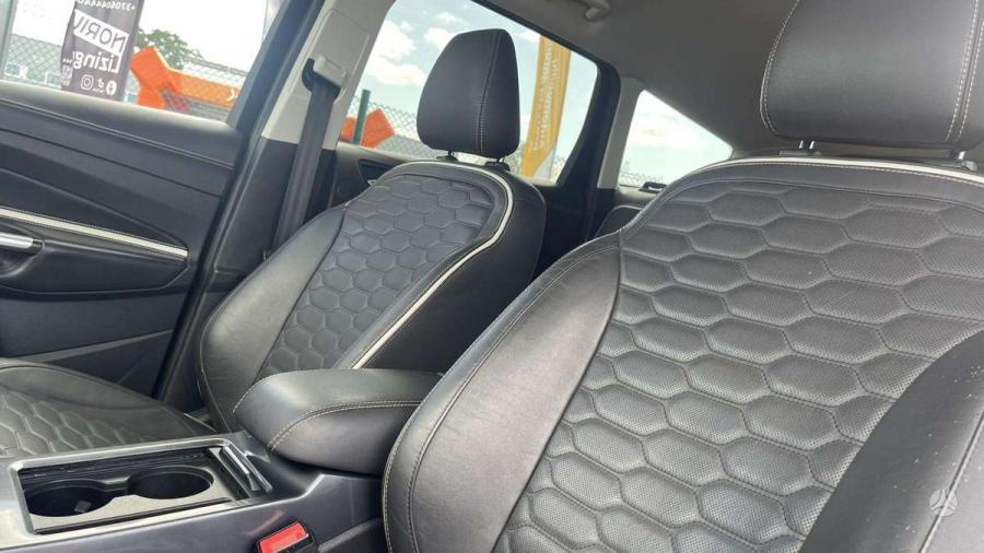 Black Ford Kuga 2019 in Marijampole, with an engine capacity of 2.00 L and mileage of 221 thousand km for 13900 €, photo 36 on AUTOMOTO.COM.LV