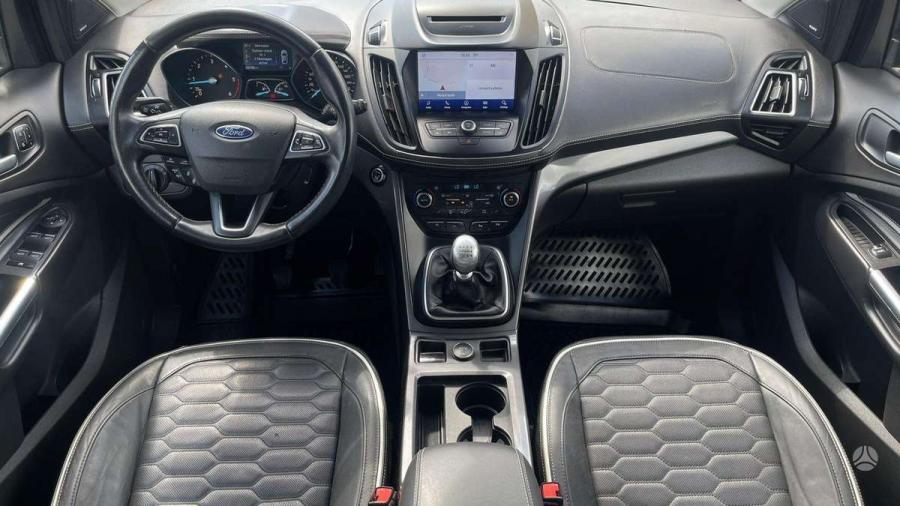 Black Ford Kuga 2019 in Marijampole, with an engine capacity of 2.00 L and mileage of 221 thousand km for 13900 €, photo 41 on AUTOMOTO.COM.LV