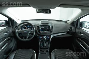 Black Ford Kuga 2019 in Riga, with an engine capacity of 1.50 L and mileage of 65 thousand km for 12990 €, photo 7 on AUTOMOTO.COM.LV