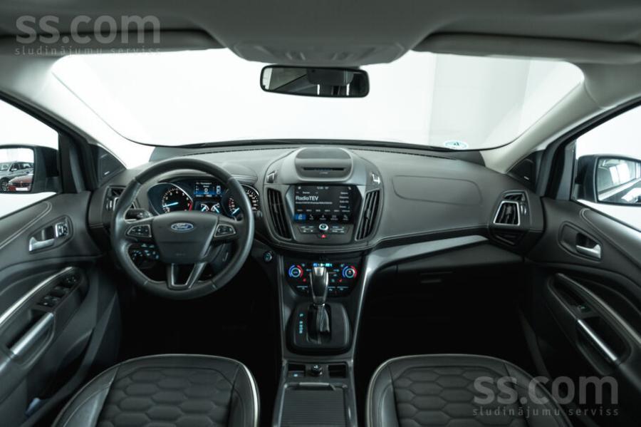 Black Ford Kuga 2019 in Riga, with an engine capacity of 1.50 L and mileage of 65 thousand km for 12990 €, photo 7 on AUTOMOTO.COM.LV