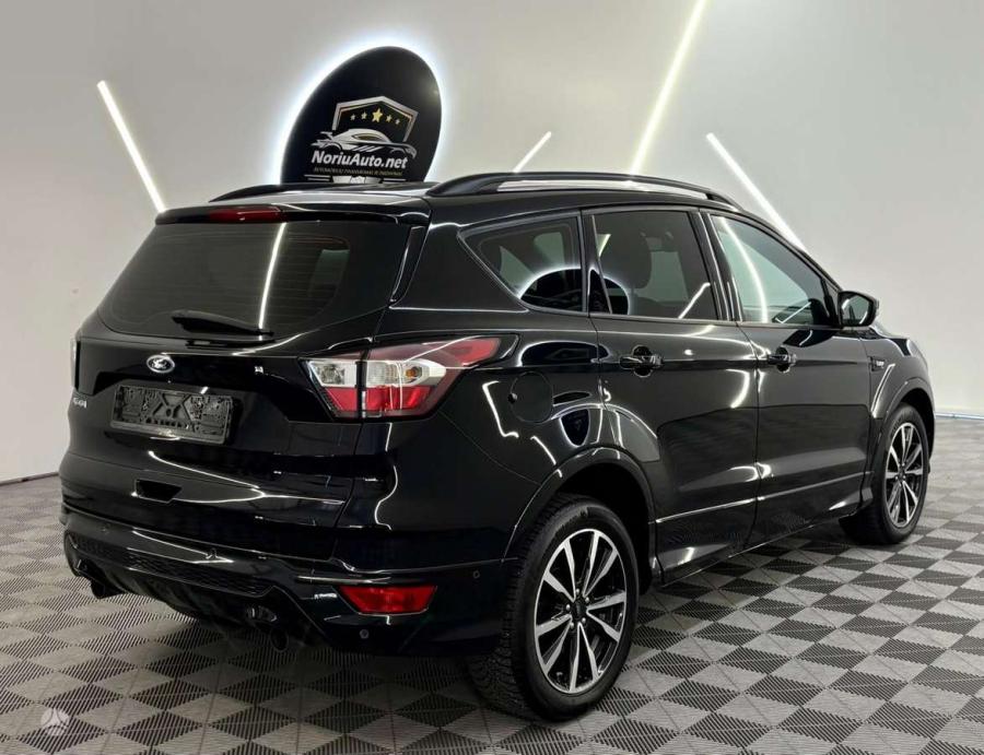 Black Ford Kuga 2019 in Marijampole, with an engine capacity of 1.50 L and mileage of 144 thousand km for 11999 €, photo 24 on AUTOMOTO.COM.LV