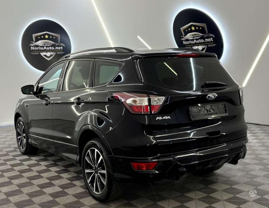 Black Ford Kuga 2019 in Marijampole, with an engine capacity of 1.50 L and mileage of 144 thousand km for 11999 €, photo 26 on AUTOMOTO.COM.LV
