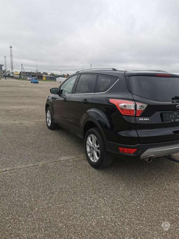 Black Ford Kuga 2019 in Kaunas, with an engine capacity of 1.50 L and mileage of 90 thousand km for 12700 €, photo 5 on AUTOMOTO.COM.LV