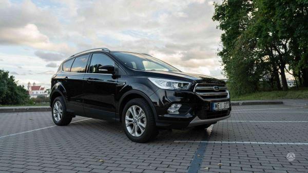 Ford Kuga 2019 in Vilnius on AUTOMOTO.COM.LV Black Ford Kuga 2019 in Vilnius, with an engine capacity of 1.50 L and mileage of 62 thousand km for 15300 €, photo 1 on AUTOMOTO.COM.LV