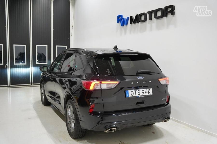 Black Ford Kuga 2020 in Kaunas, with an engine capacity of 0.00 L and mileage of 67 thousand km for 22550 €, photo 4 on AUTOMOTO.COM.LV
