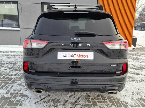Black Ford Kuga 2020 in Vilnius, with an engine capacity of 2.50 L and mileage of 140 thousand km for 19965 €, photo 6 on AUTOMOTO.COM.LV