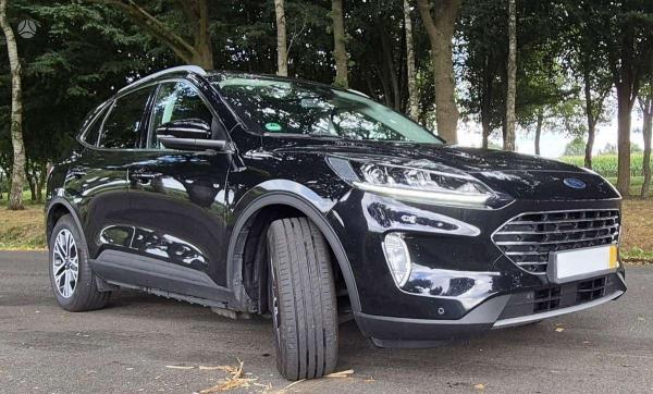 Black Ford Kuga 2020 in Kaunas, with an engine capacity of 2.49 L and mileage of 86 thousand km for 15750 €, photo 5 on AUTOMOTO.COM.LV