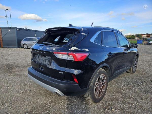 Black Ford Kuga 2020 in Kaunas, with an engine capacity of 2.49 L and mileage of 94 thousand km for 7999 €, photo 3 on AUTOMOTO.COM.LV