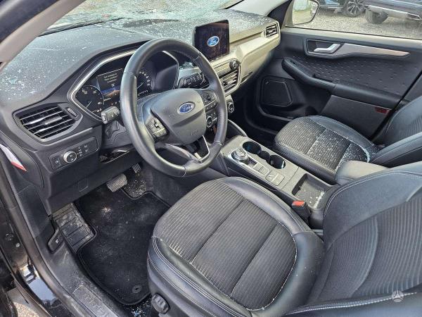 Black Ford Kuga 2020 in Kaunas, with an engine capacity of 2.49 L and mileage of 94 thousand km for 7999 €, photo 6 on AUTOMOTO.COM.LV