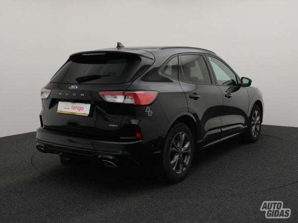 Black Ford Kuga 2021 in Vilnius, with an engine capacity of 2.50 L and mileage of 180 thousand km for 19399 €, photo 8 on AUTOMOTO.COM.LV