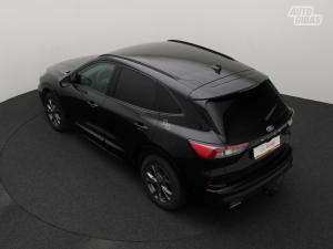 Black Ford Kuga 2021 in Vilnius, with an engine capacity of 2.50 L and mileage of 180 thousand km for 19399 €, photo 12 on AUTOMOTO.COM.LV