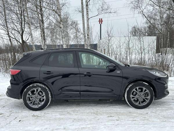 Black Ford Kuga 2021 in Kaunas, with an engine capacity of 2.49 L and mileage of 158 thousand km for 18950 €, photo 9 on AUTOMOTO.COM.LV