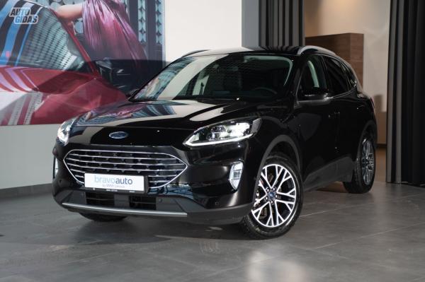 Black Ford Kuga 2021 in Kaunas, with an engine capacity of 2.50 L and mileage of 69 thousand km for 23221 €, photo 1 on AUTOMOTO.COM.LV