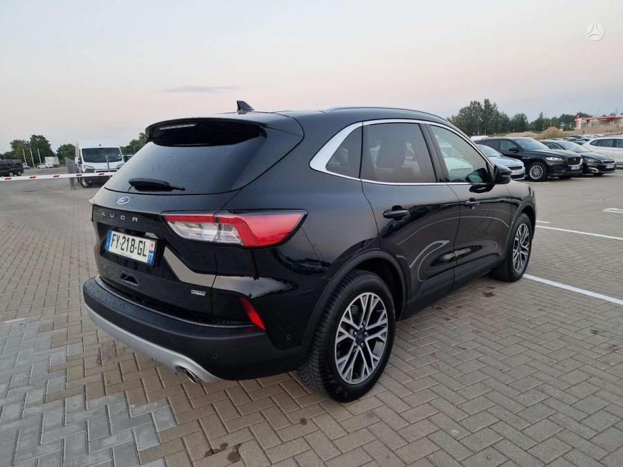 Black Ford Kuga 2021 in Taurage, with an engine capacity of 2.49 L and mileage of 156 thousand km for 14600 €, photo 6 on AUTOMOTO.COM.LV