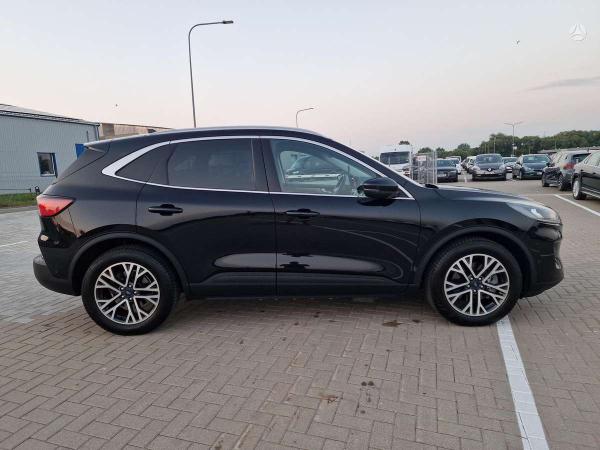 Black Ford Kuga 2021 in Taurage, with an engine capacity of 2.49 L and mileage of 156 thousand km for 14600 €, photo 6 on AUTOMOTO.COM.LV