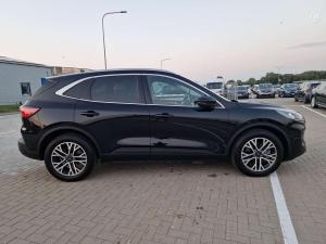 Black Ford Kuga 2021 in Taurage, with an engine capacity of 2.49 L and mileage of 156 thousand km for 14600 €, photo 7 on AUTOMOTO.COM.LV