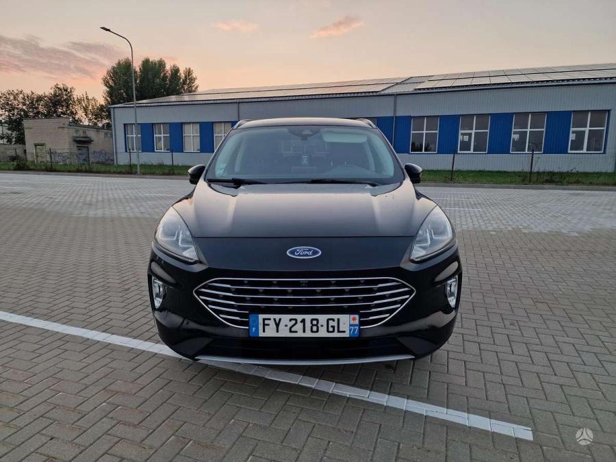 Black Ford Kuga 2021 in Taurage, with an engine capacity of 2.49 L and mileage of 156 thousand km for 14600 €, photo 9 on AUTOMOTO.COM.LV