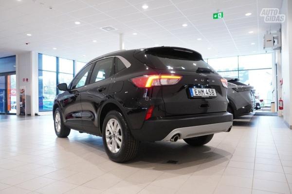 Black Ford Kuga 2022 in Kaunas, with an engine capacity of 0.00 L and mileage of 69 thousand km for 24705 €, photo 4 on AUTOMOTO.COM.LV