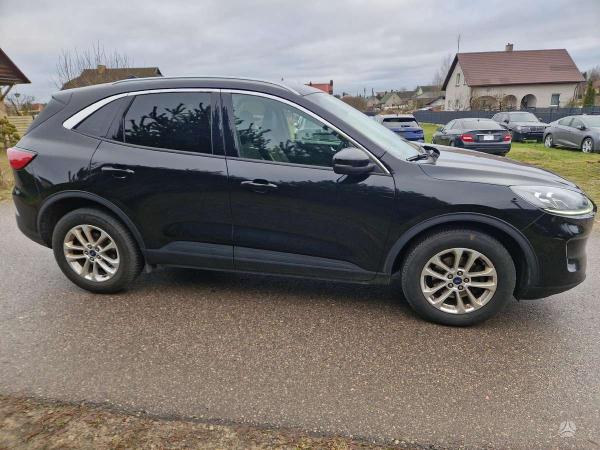 Black Ford Kuga 2022 in Vilnius, with an engine capacity of 1.50 L and mileage of 174 thousand km for 14400 €, photo 4 on AUTOMOTO.COM.LV