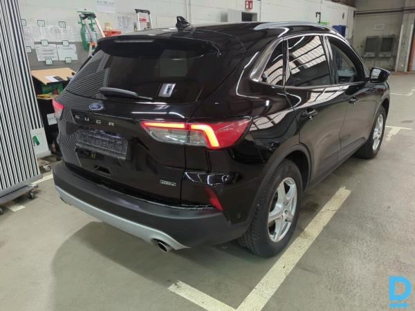 Black Ford Kuga 2023 in Ventspils, with an engine capacity of 2.50 L and mileage of 200 thousand km for 14900 €, photo 4 on AUTOMOTO.COM.LV