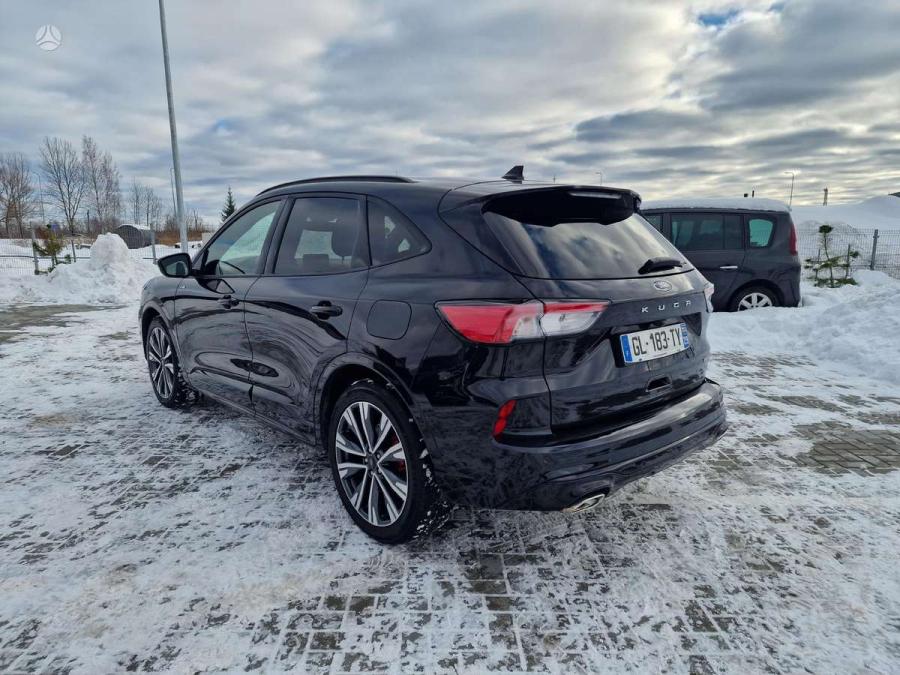 Black Ford Kuga 2023 in Taurage, with an engine capacity of 2.50 L and mileage of 170 thousand km for 14990 €, photo 5 on AUTOMOTO.COM.LV