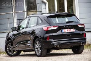 Black Ford Kuga 2023 in Tukums, with an engine capacity of 2.50 L and mileage of 198 thousand km for 16500 €, photo 5 on AUTOMOTO.COM.LV