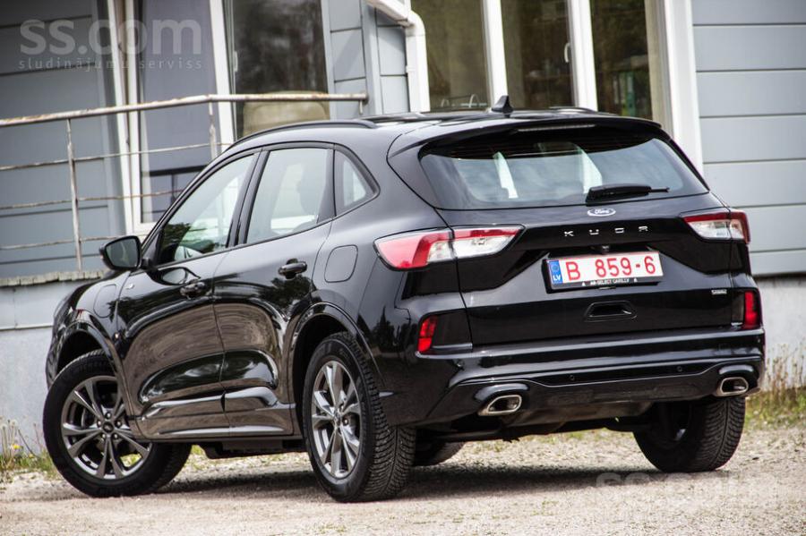 Black Ford Kuga 2023 in Tukums, with an engine capacity of 2.50 L and mileage of 198 thousand km for 16500 €, photo 5 on AUTOMOTO.COM.LV