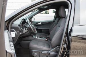 Black Ford Kuga 2023 in Tukums, with an engine capacity of 2.50 L and mileage of 198 thousand km for 16500 €, photo 11 on AUTOMOTO.COM.LV