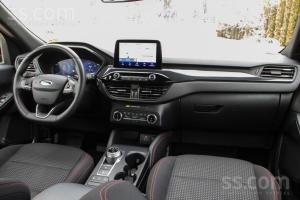 Black Ford Kuga 2023 in Tukums, with an engine capacity of 2.50 L and mileage of 198 thousand km for 16500 €, photo 12 on AUTOMOTO.COM.LV