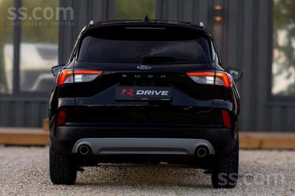 Black Ford Kuga 2023 in Jelgava, with an engine capacity of 2.00 L and mileage of 207 thousand km for 14900 €, photo 5 on AUTOMOTO.COM.LV