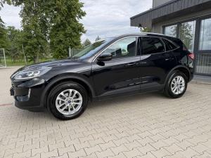 Black Ford Kuga 2023 in Siauliai, with an engine capacity of 2.50 L and mileage of 159 thousand km for 15718 €, photo 4 on AUTOMOTO.COM.LV