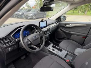 Black Ford Kuga 2023 in Siauliai, with an engine capacity of 2.50 L and mileage of 159 thousand km for 15718 €, photo 13 on AUTOMOTO.COM.LV