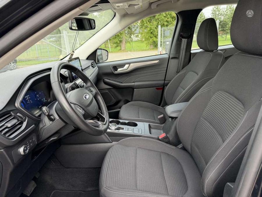 Black Ford Kuga 2023 in Siauliai, with an engine capacity of 2.50 L and mileage of 159 thousand km for 15718 €, photo 14 on AUTOMOTO.COM.LV