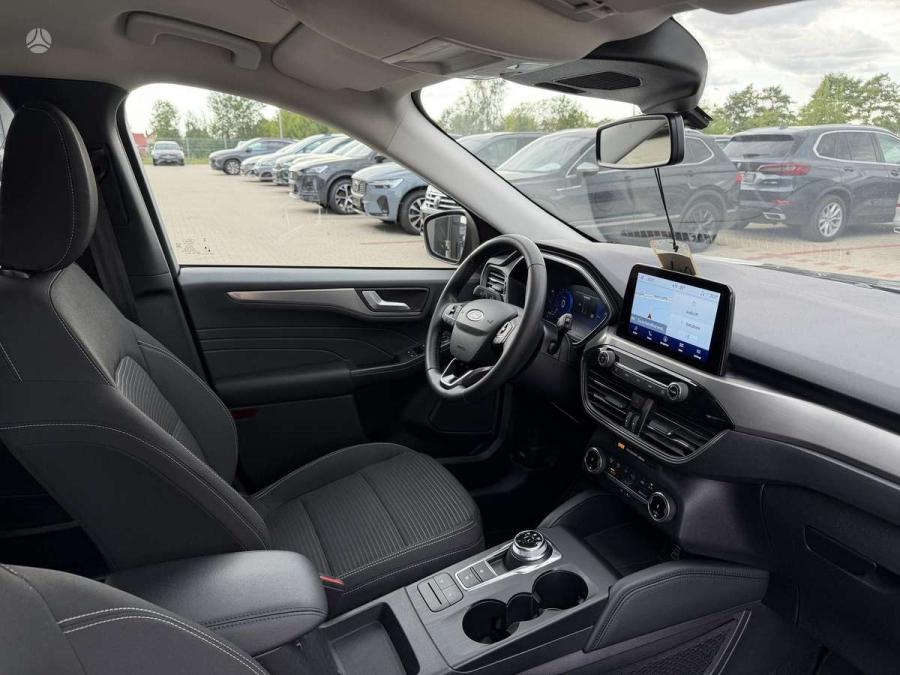 Black Ford Kuga 2023 in Siauliai, with an engine capacity of 2.50 L and mileage of 159 thousand km for 15718 €, photo 18 on AUTOMOTO.COM.LV