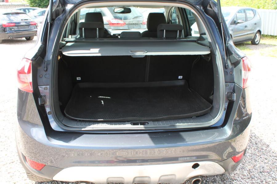 Blue Ford Kuga 2009 in Daugavpils, with an engine capacity of 2.00 L and mileage of 275 thousand km for 5590 €, photo 10 on AUTOMOTO.COM.LV