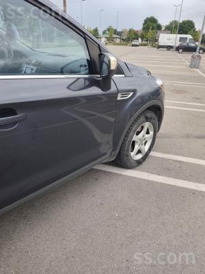 Blue Ford Kuga 2009 in Jelgava, with an engine capacity of 2.00 L and mileage of 237 thousand km for 3800 €, photo 4 on AUTOMOTO.COM.LV