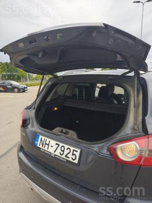 Blue Ford Kuga 2009 in Jelgava, with an engine capacity of 2.00 L and mileage of 237 thousand km for 3800 €, photo 5 on AUTOMOTO.COM.LV