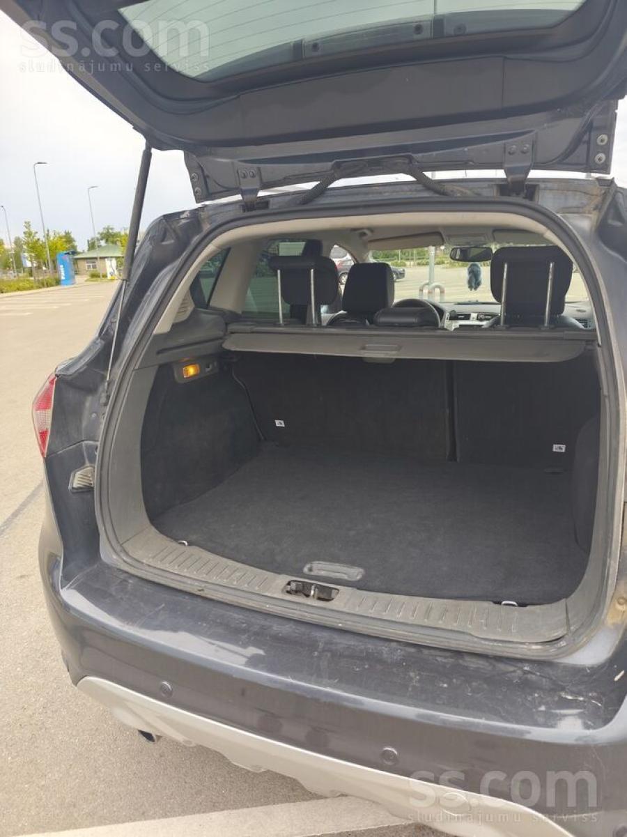 Blue Ford Kuga 2009 in Jelgava, with an engine capacity of 2.00 L and mileage of 237 thousand km for 3800 €, photo 6 on AUTOMOTO.COM.LV