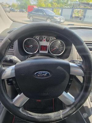 Blue Ford Kuga 2011 in Siauliai, with an engine capacity of 2.00 L and mileage of 266 thousand km for 4600 €, photo 17 on AUTOMOTO.COM.LV