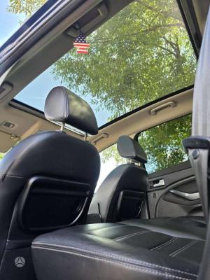 Blue Ford Kuga 2011 in Siauliai, with an engine capacity of 2.00 L and mileage of 266 thousand km for 4600 €, photo 13 on AUTOMOTO.COM.LV