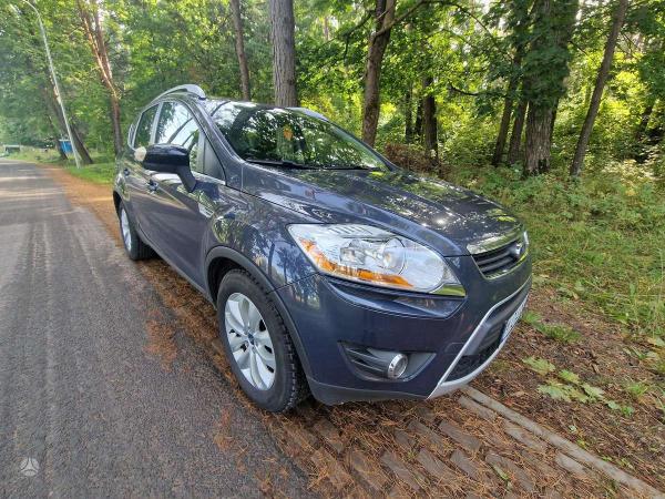 Blue Ford Kuga 2011 in Ukmerge, with an engine capacity of 2.00 L and mileage of 243 thousand km for 5750 €, photo 1 on AUTOMOTO.COM.LV