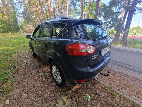 Blue Ford Kuga 2011 in Ukmerge, with an engine capacity of 2.00 L and mileage of 243 thousand km for 5750 €, photo 5 on AUTOMOTO.COM.LV