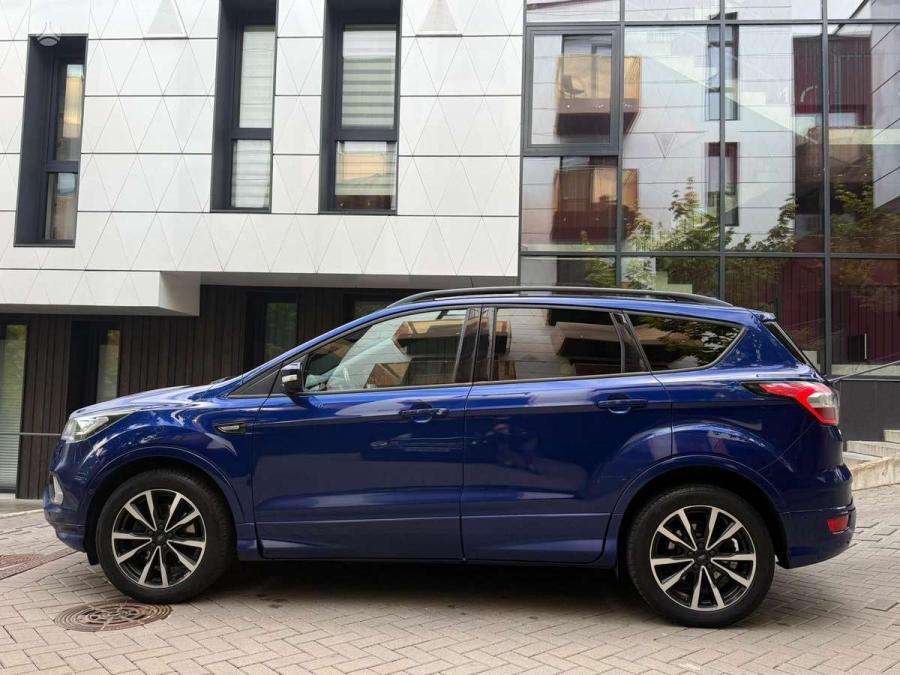Blue Ford Kuga 2018 in Kaunas, with an engine capacity of 1.50 L and mileage of 254 thousand km for 9600 €, photo 5 on AUTOMOTO.COM.LV