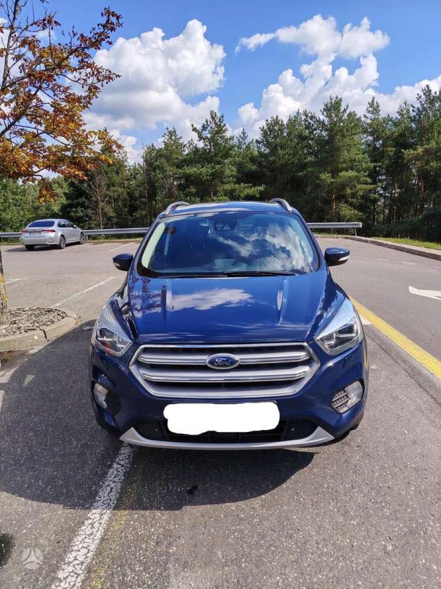 Blue Ford Kuga 2018 in Vilnius, with an engine capacity of 1.50 L and mileage of 117 thousand km for 10500 €, photo 1 on AUTOMOTO.COM.LV