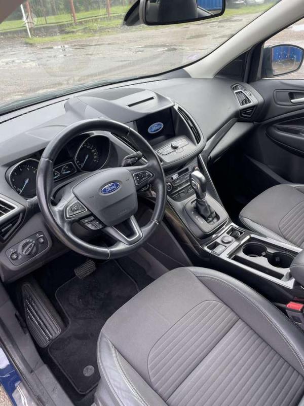 Blue Ford Kuga 2019 in Prienai, with an engine capacity of 1.50 L and mileage of 168 thousand km for 7200 €, photo 10 on AUTOMOTO.COM.LV