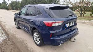 Blue Ford Kuga 2020 in Siauliai, with an engine capacity of 2.50 L and mileage of 240 thousand km for 17300 €, photo 6 on AUTOMOTO.COM.LV